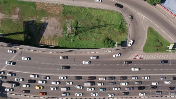 Transport Aerials - top down view of freeway busy city rush hour heavy ...