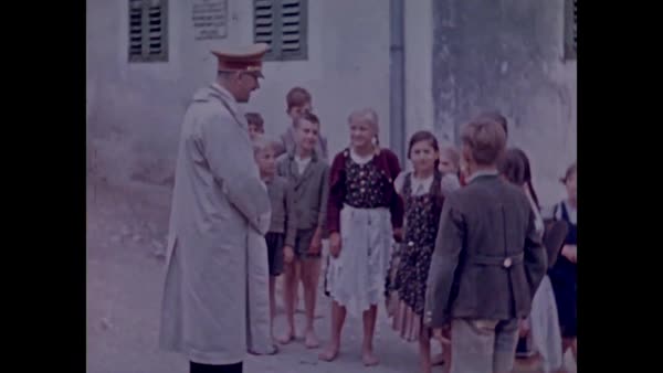 World War Two. Adolf Hitler greets schoolchildren at Fischlham, Austria ...