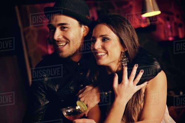 Cheerful couple together at the club enjoying the nightlife - Stock ...