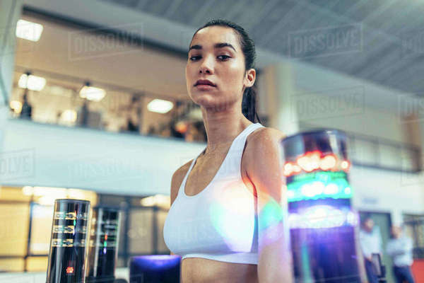 Reaction time training session at gym. Female athlete with visual ...