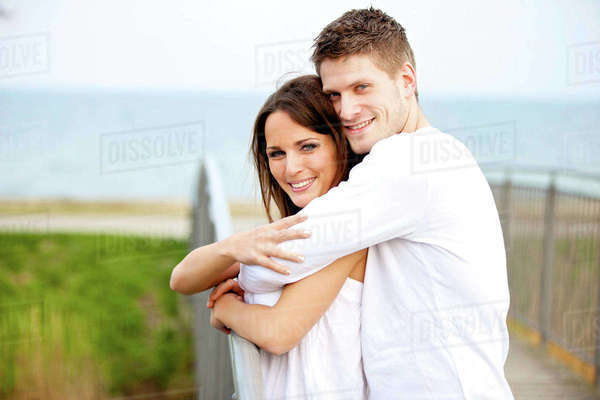 Portrait of a romantic couple hugging in the park - Royalty-free Stock ...