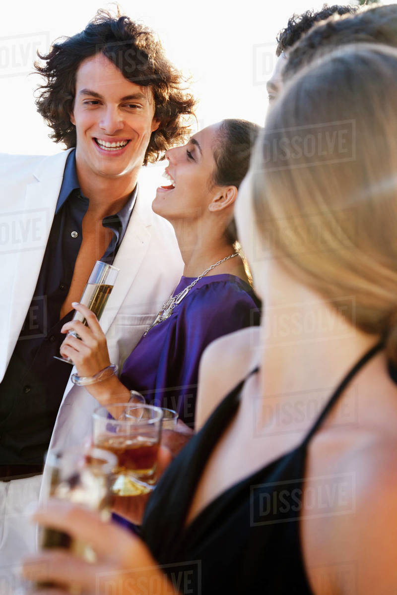 Friends drinking cocktails together at party - Royalty-free Stock Photo ...