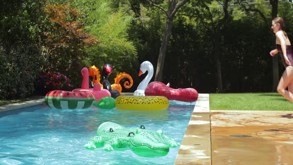 Friends running and jumping into swimming pool - HD Royalty-free Stock ...