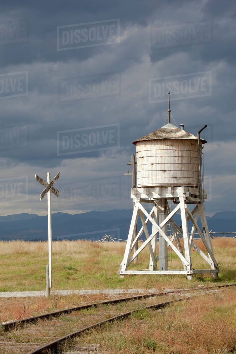 Water tower near a railroad track, Fort Steele, British Columbia ...