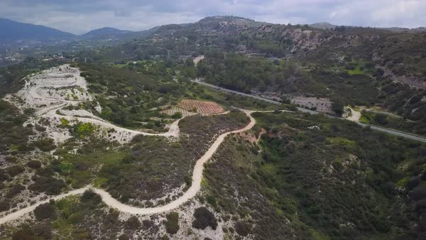 Vineyard and road in mountain, aerial view in spring day, good weather ...