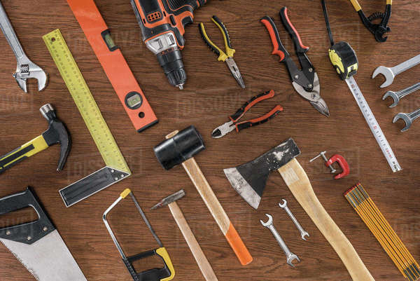 Top view of arranged various tools on wooden table - Royalty-free Stock ...