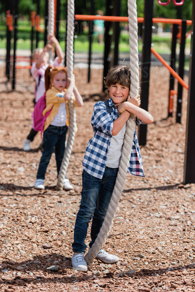 cute little kids playing together on playground - Royalty-free Stock ...