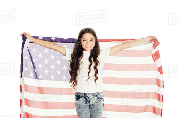 Smiling adorable preteen kid holding American flag and looking at ...