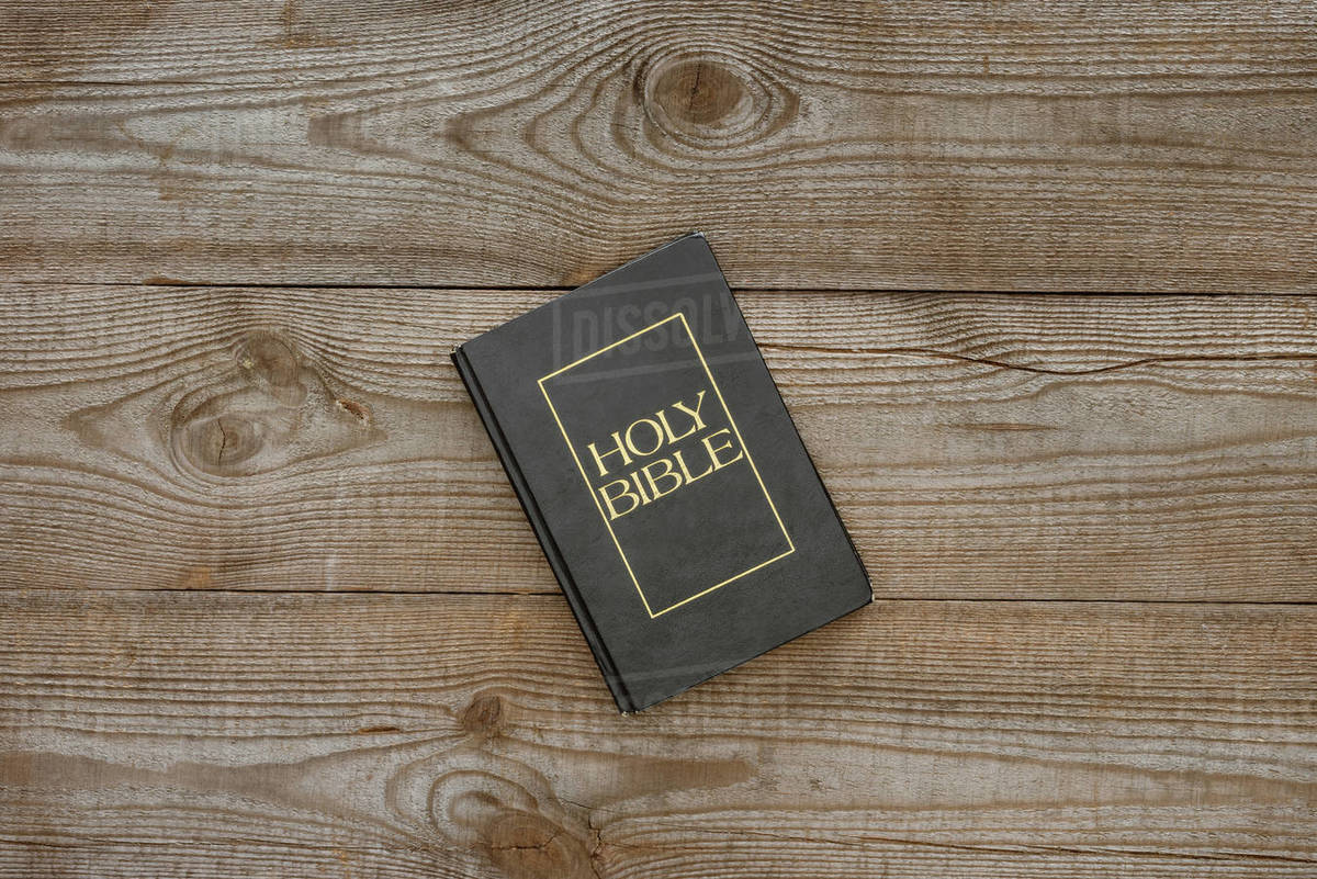 Top view of holy bible on rustic wooden tabletop - Royalty-free Stock ...