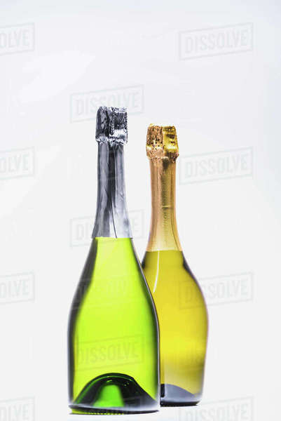 Close up view of bottles of champagne isolated on white - Royalty-free ...