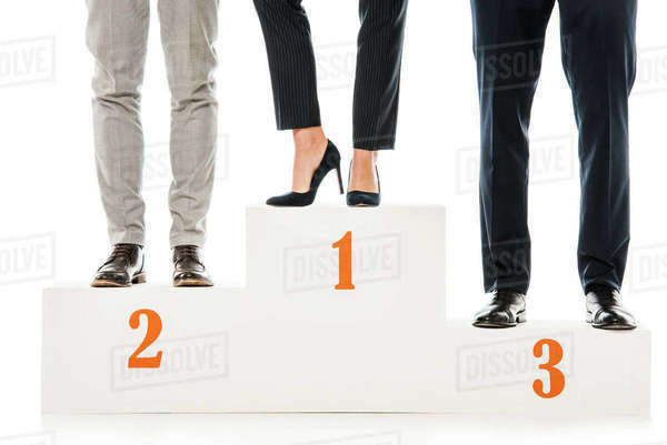 low section of businesspeople standing on winners podium isolated on ...