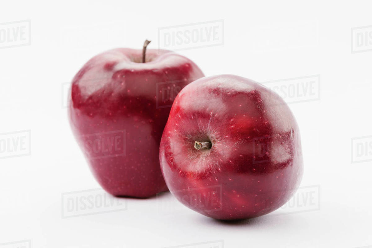 ripe large red delicious apples on white background - Stock Photo ...