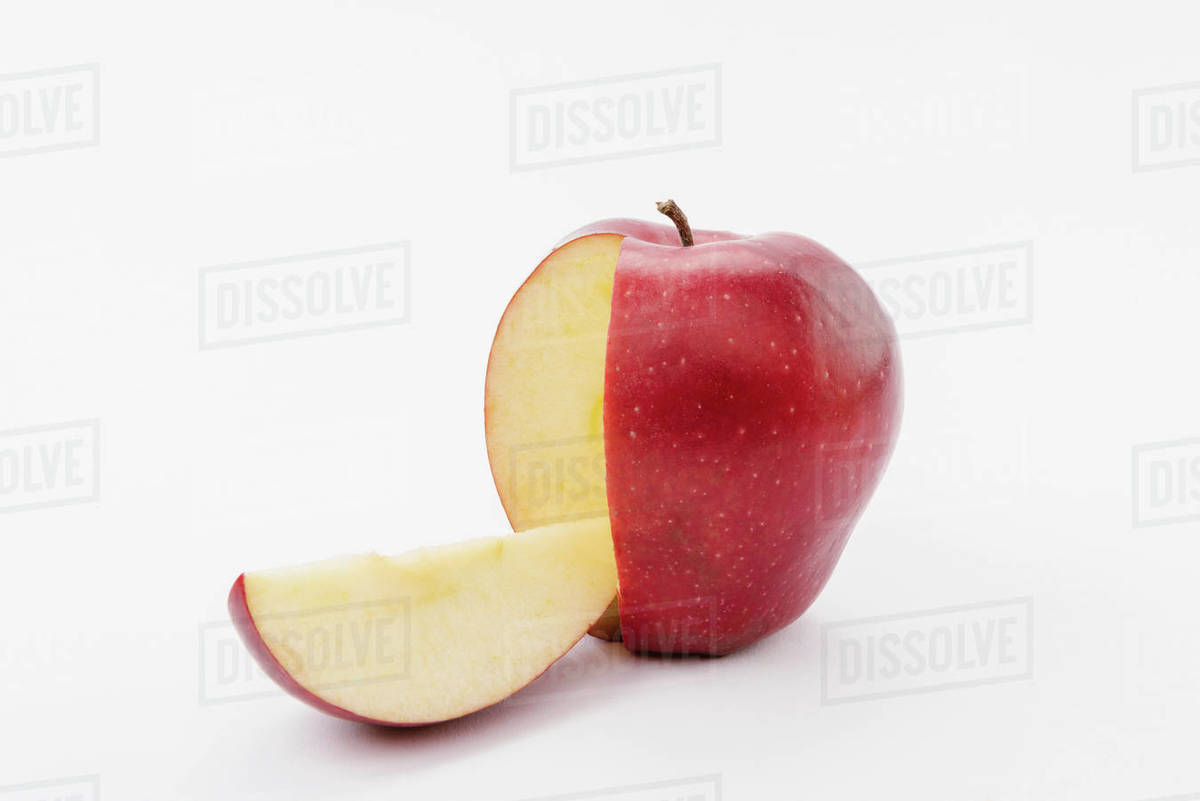 cut large red delicious apple on white background - Royalty-free Stock ...