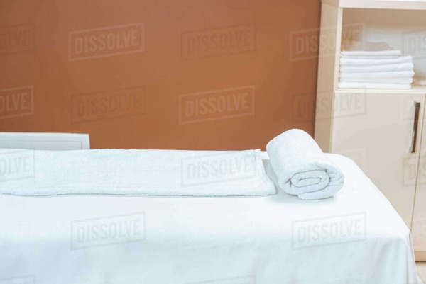 Empty spa room with clean white towels - Royalty-free Stock Photo ...