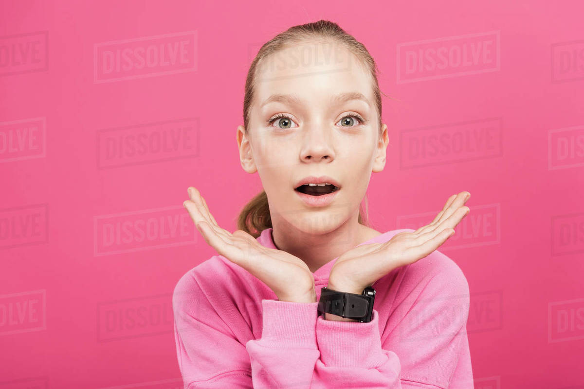 surprised blonde kid looking at camera, isolated on pink - Royalty-free ...