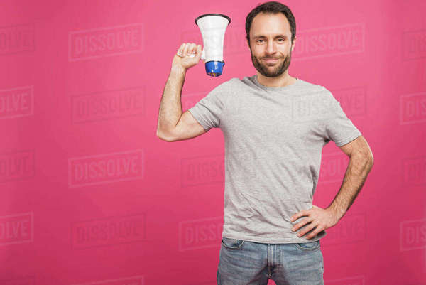 Smiling man holding megaphone, isolated on pink - Royalty-free Stock ...