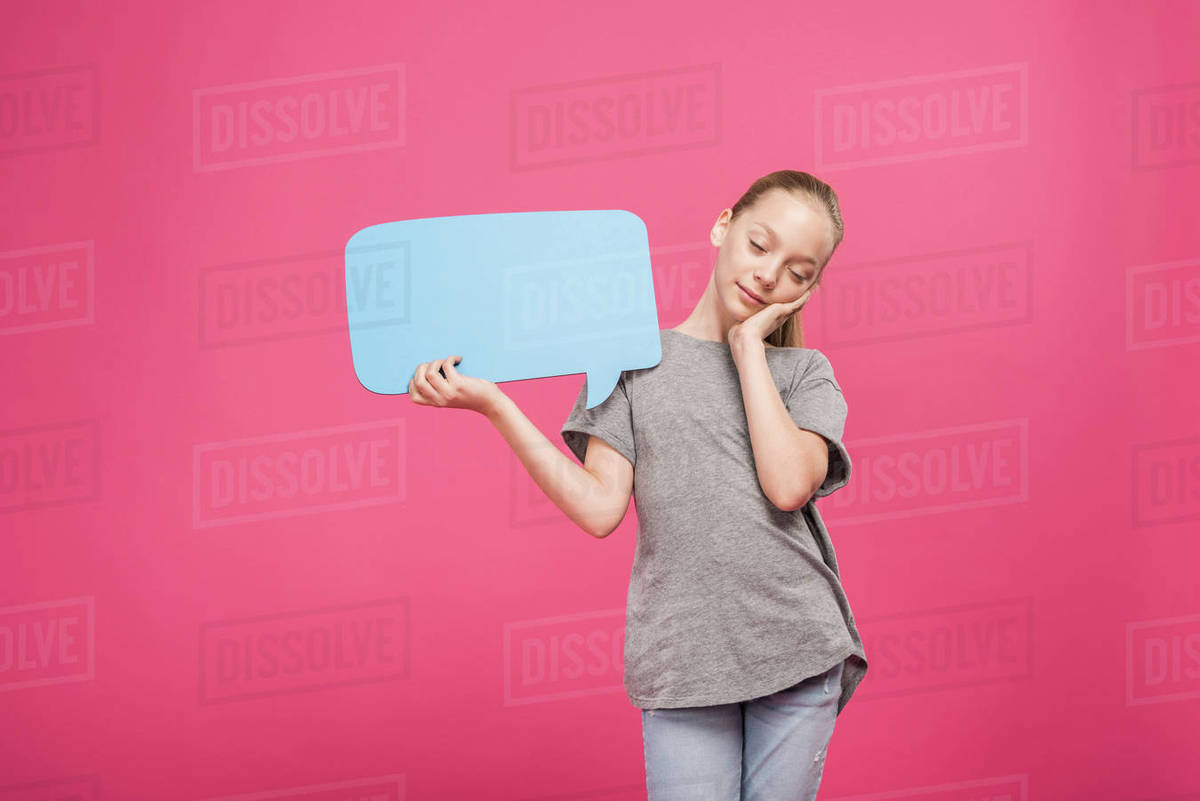 Tired youngster relaxing and holding blue speech bubble, isolated on ...