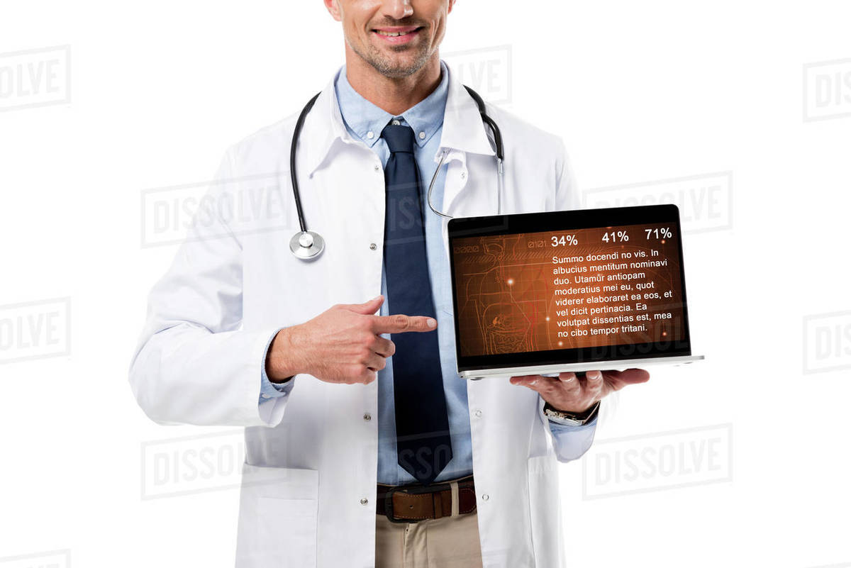 Cropped view of smiling doctor pointing finger at laptop with health ...