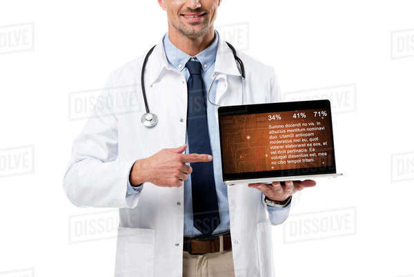 Cropped view of smiling doctor pointing finger at laptop with health ...