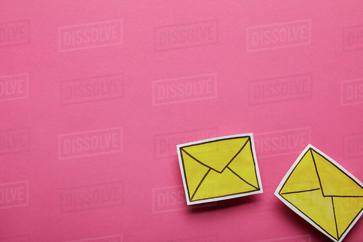 Top view of two yellow message icons on pink background - Royalty-free ...