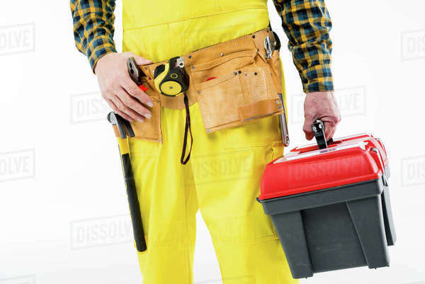 Partial view of workman holding tool kit isolated on white - Royalty ...