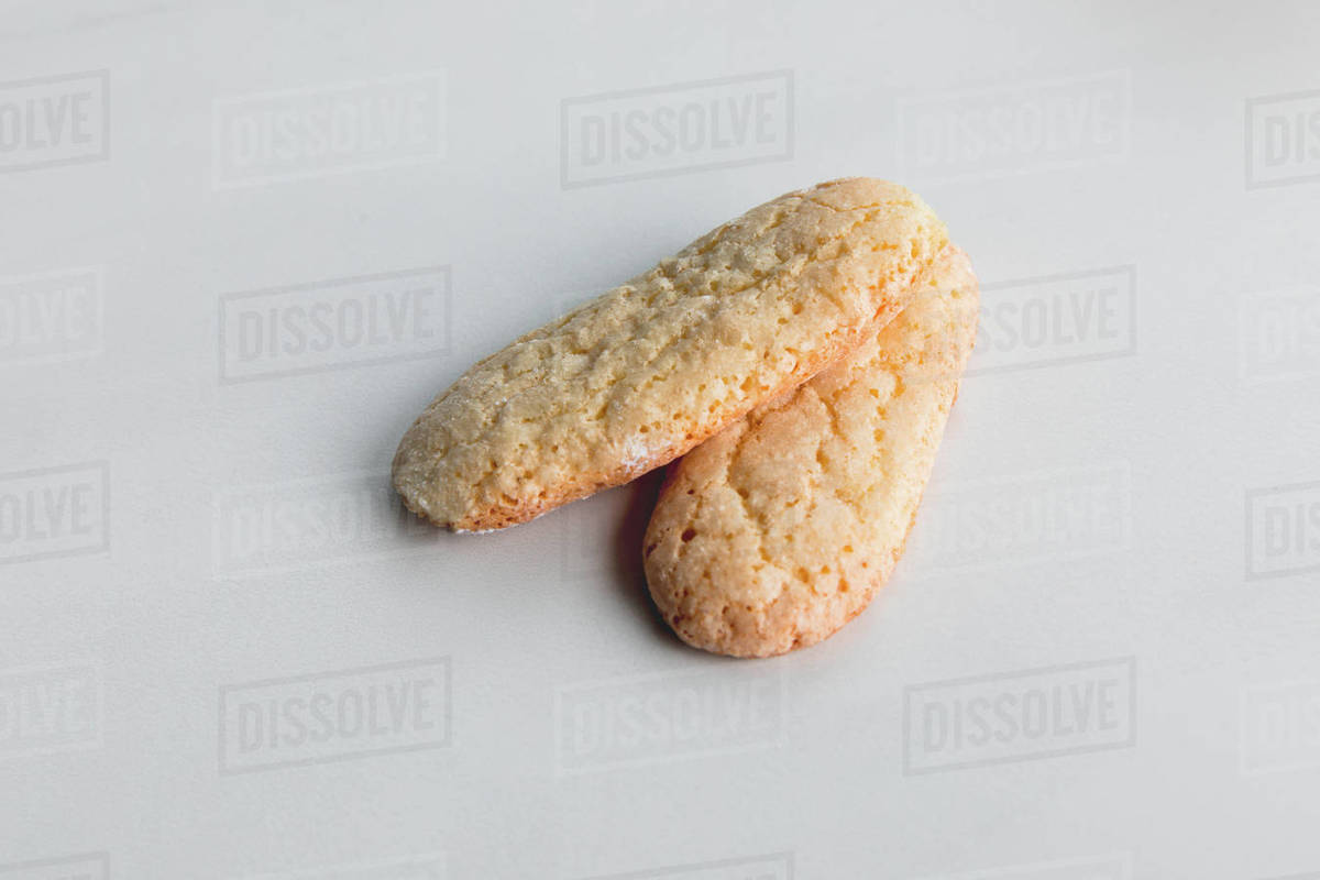 Close up of two sweet shortbread cookies on grey background - Stock ...