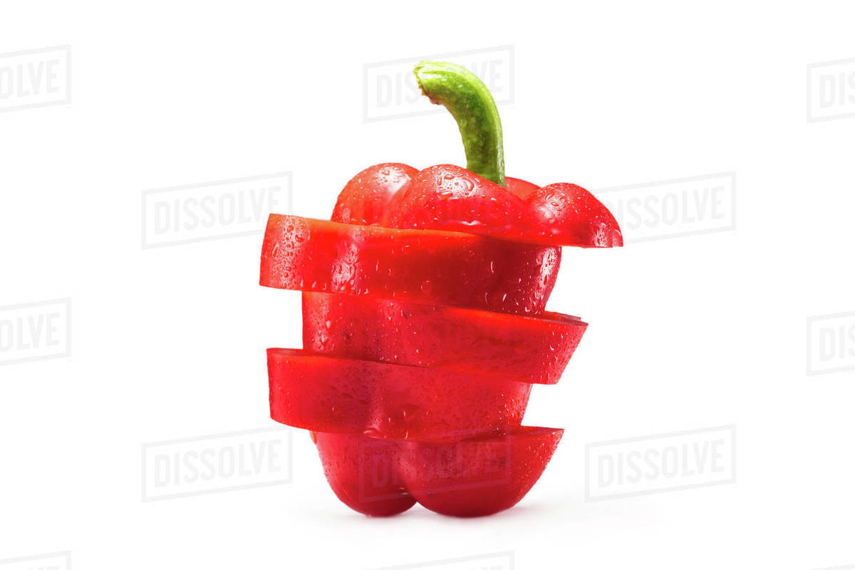Sliced red bell pepper isolated on white - Royalty-free Stock Photo ...