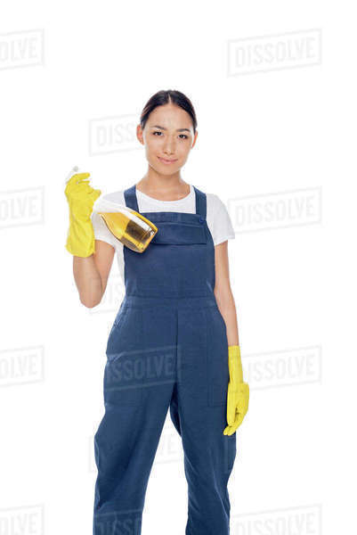 portrait of young asian cleaner in rubber gloves with detergent in hand ...