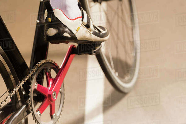 Partial view of cyclist riding bicycle on cycle race track - Royalty ...