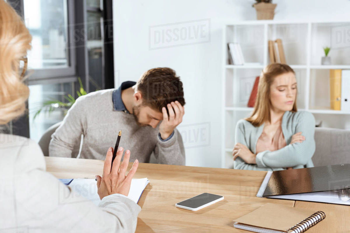 upset emotional young couple visiting psychotherapist - Royalty-free ...