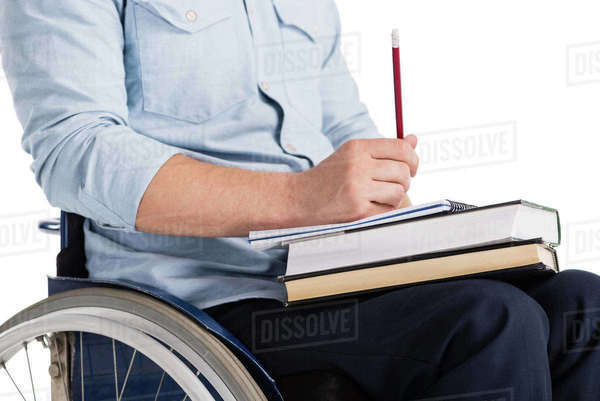 Cropped shot of physically handicapped man on wheelchair with books and ...