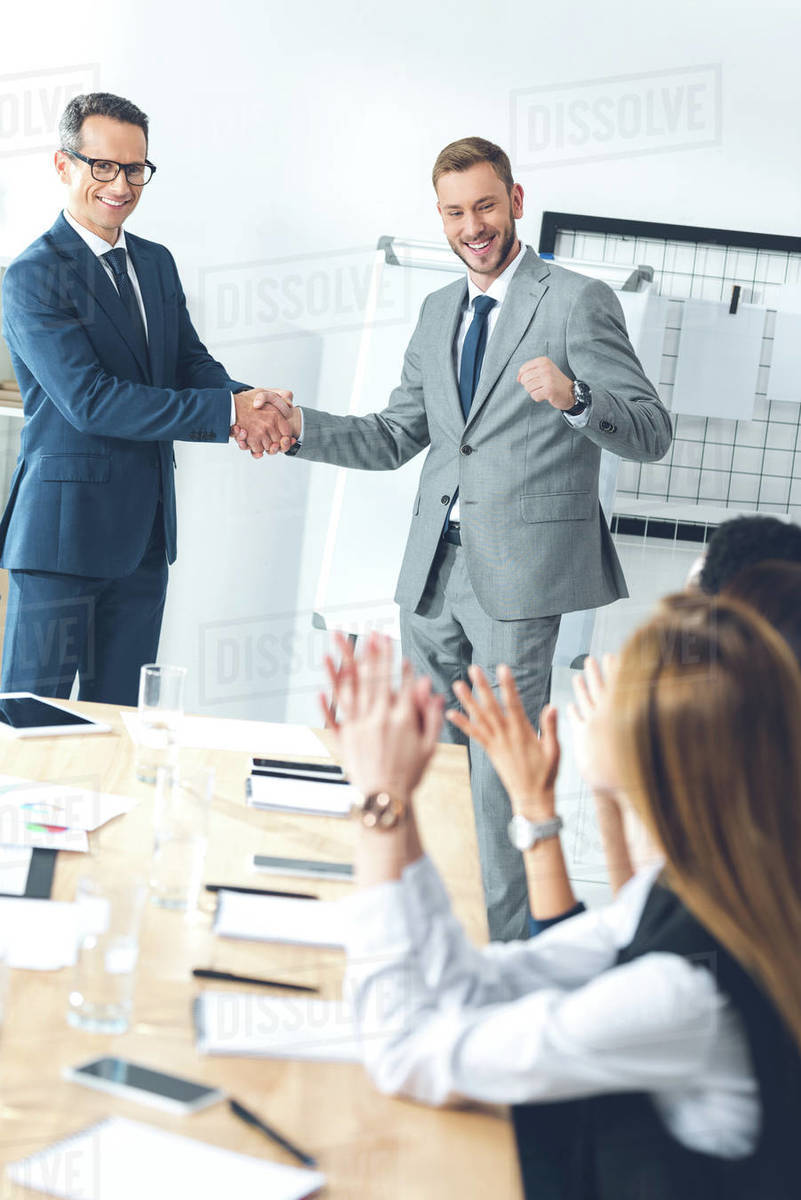 Employer And Employee Shaking Hands