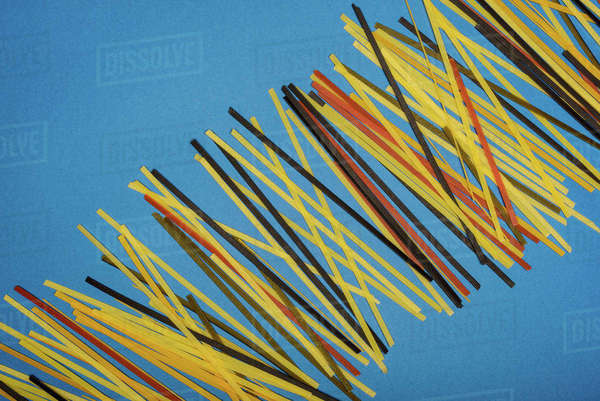 Composition of raw colored spaghetti on blue - Royalty-free Stock Photo ...