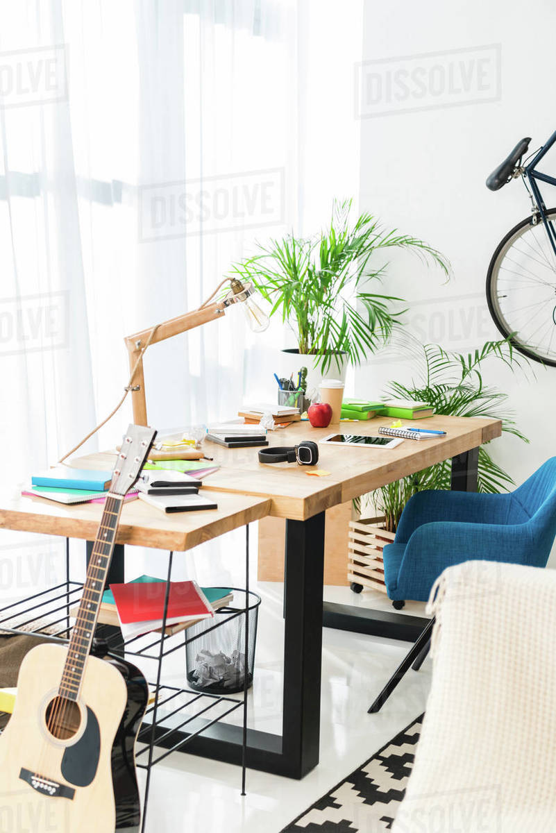 Working table and acoustic guitar at home - Royalty-free Stock Photo ...