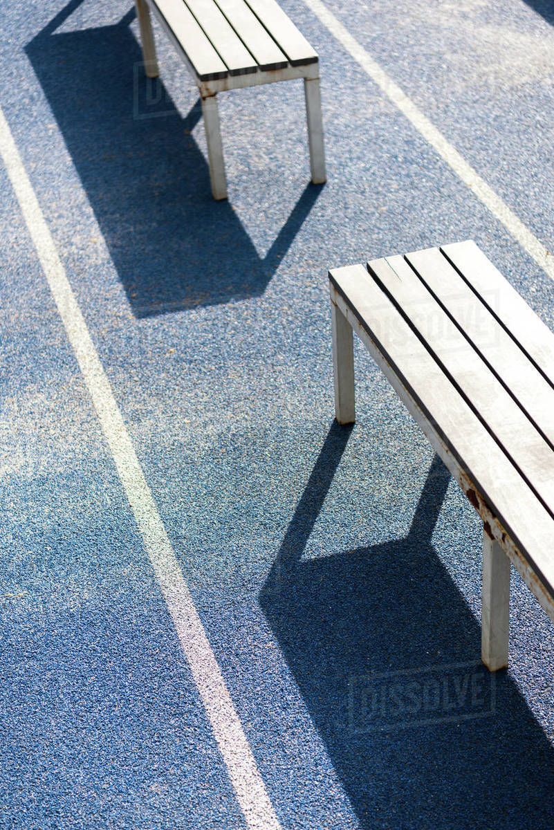 Close up view of benches on running track on Olympic stadium - Royalty ...