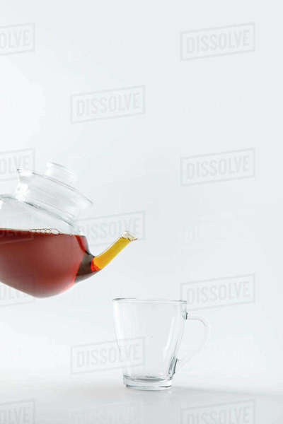 Full teapot with cup isolated on white - Royalty-free Stock Photo ...