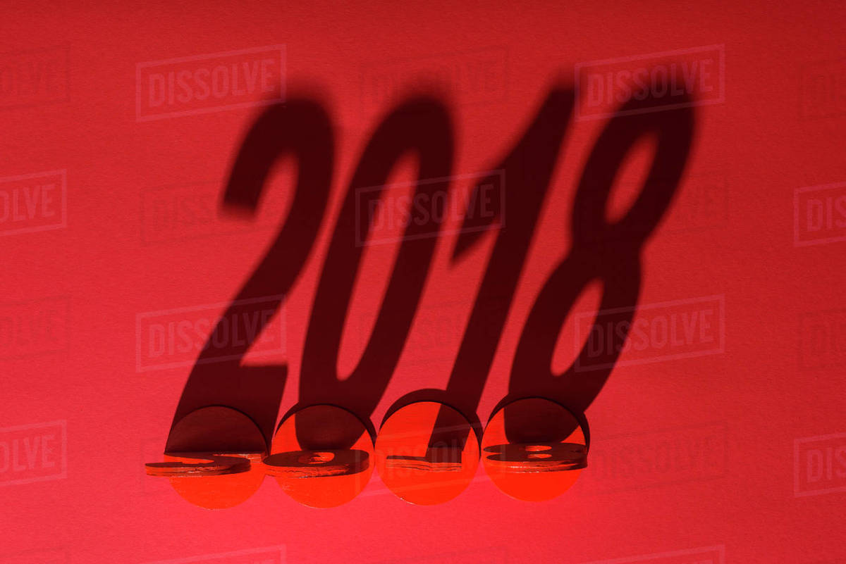 Top view of 2018 year sign shadow isolated on red - Royalty-free Stock ...