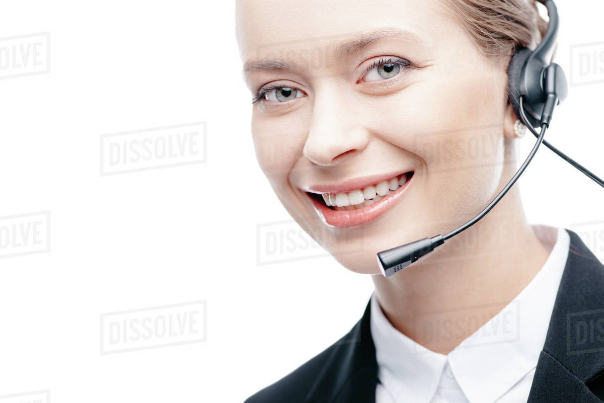 Female smiling operator working with headset, isolated on white ...