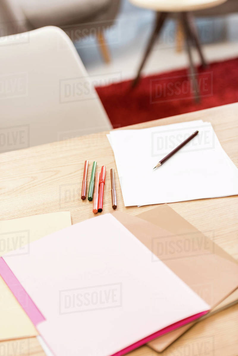 Documents and folders with markers on table in office - Royalty-free ...