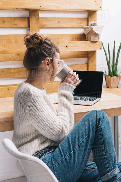 Office worker sitting on chair and drinking tea - Royalty-free Stock ...