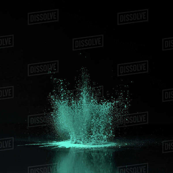 Green holi powder explosion on black, Indian festival of colors - Stock ...