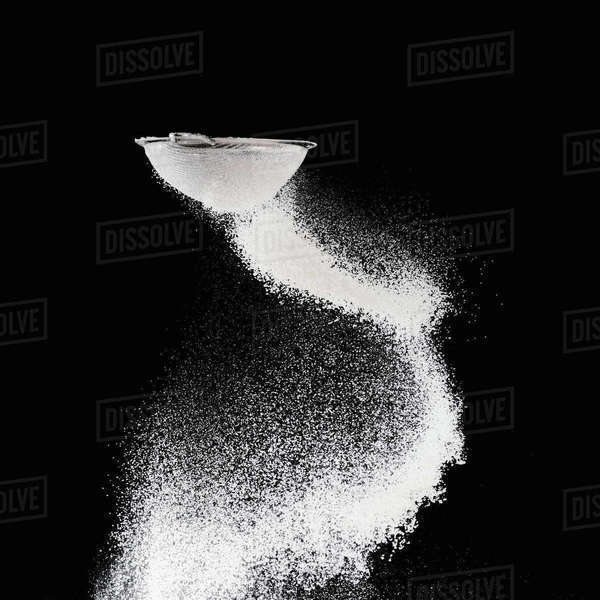 Sieve with falling flour isolated on black - Royalty-free Stock Photo ...