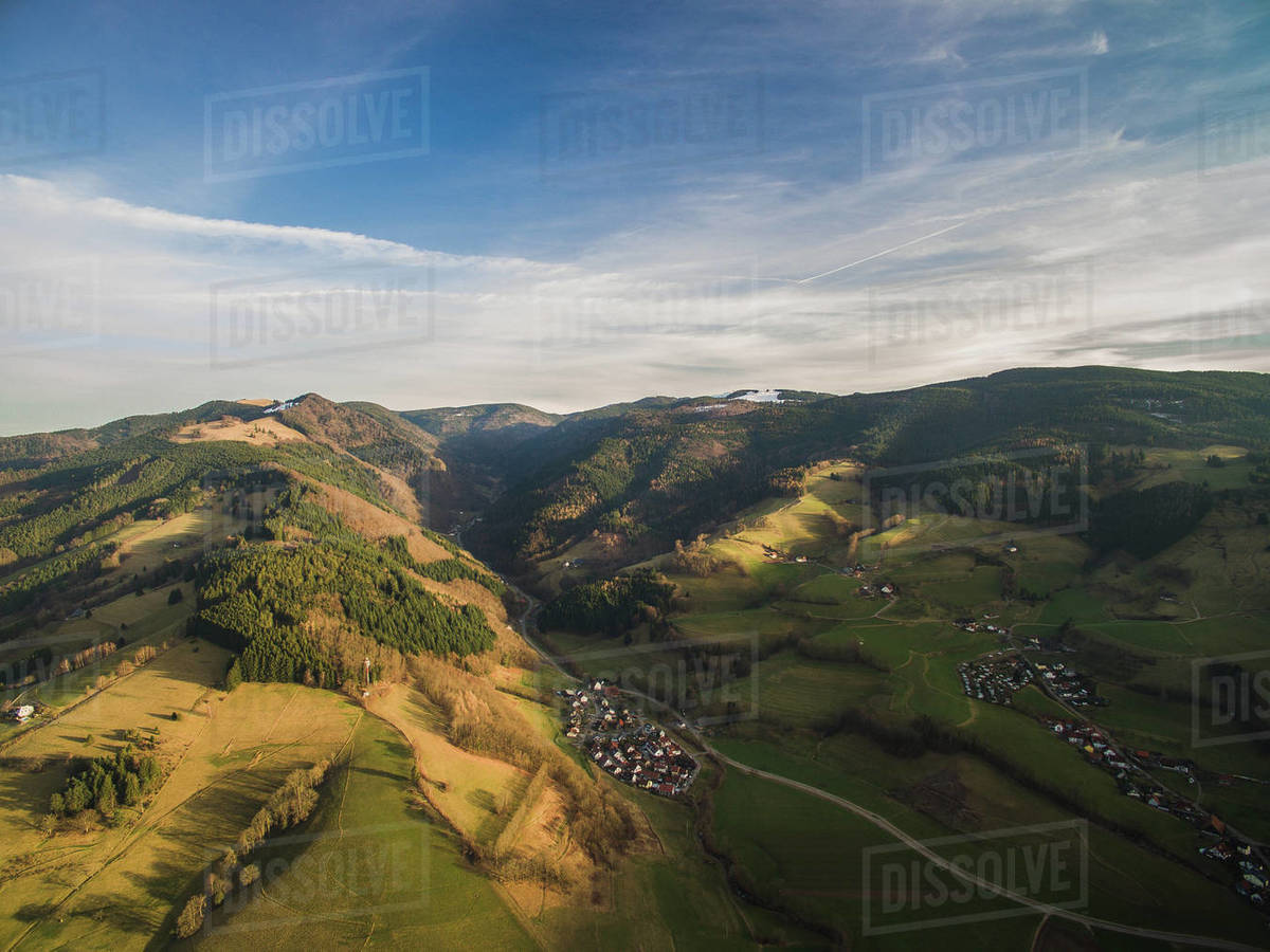 Aerial view of majestic landscape with hills and town in Germany ...