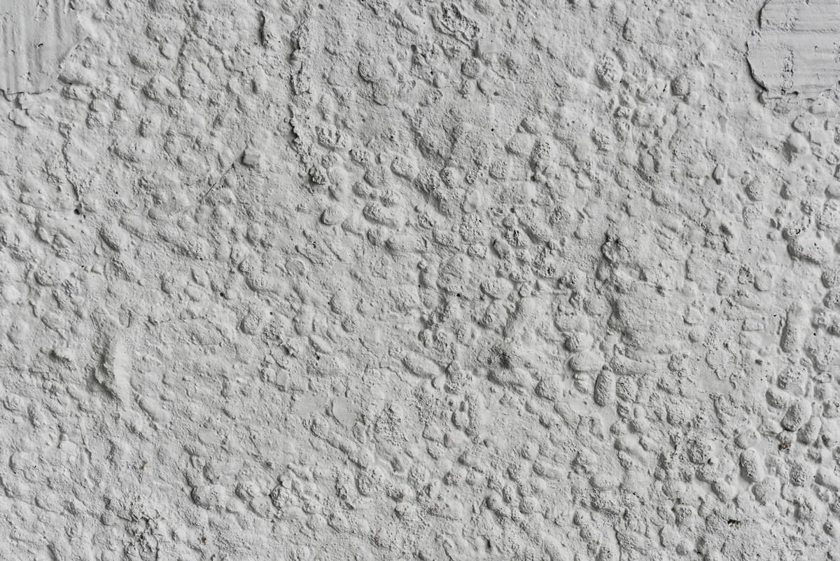 Surface of rough textured light wall - Stock Photo - Dissolve