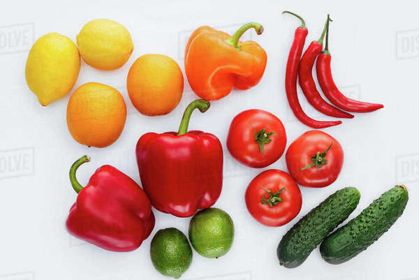 Top view of red, green and orange fruits and vegetables isolated on ...