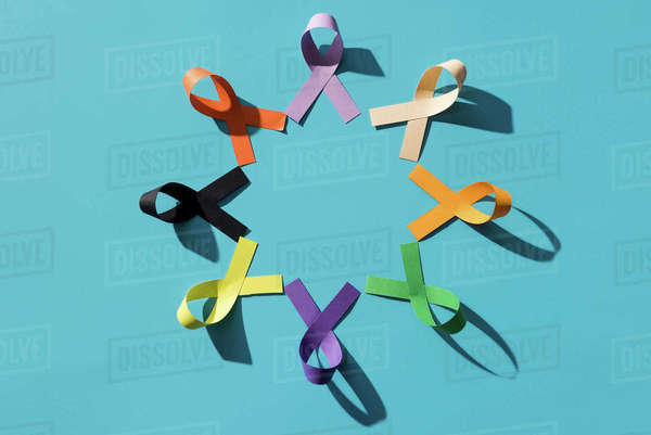 Flat lay with colorful ribbons arranged in circle isolated on blue ...