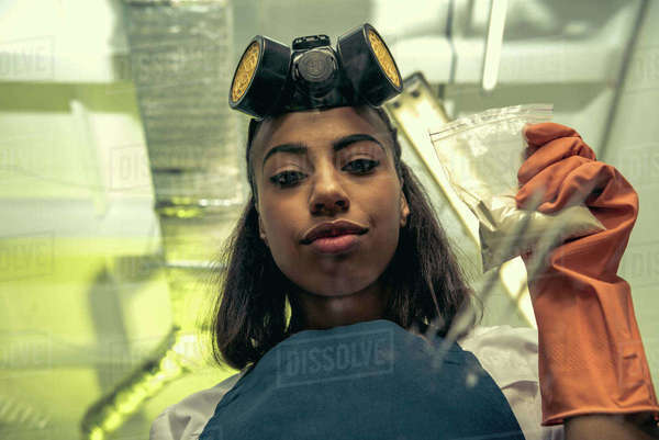 young girl laboratory technician in personal protective equipment ...