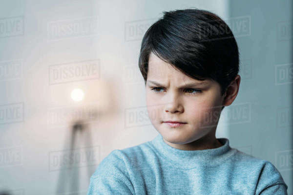 Portrait of offended sad boy looking away at home - Royalty-free Stock ...