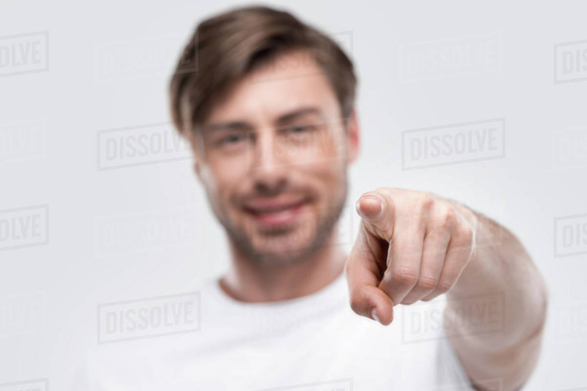 Handsome smiling man pointing at you, isolated on white - Royalty-free ...