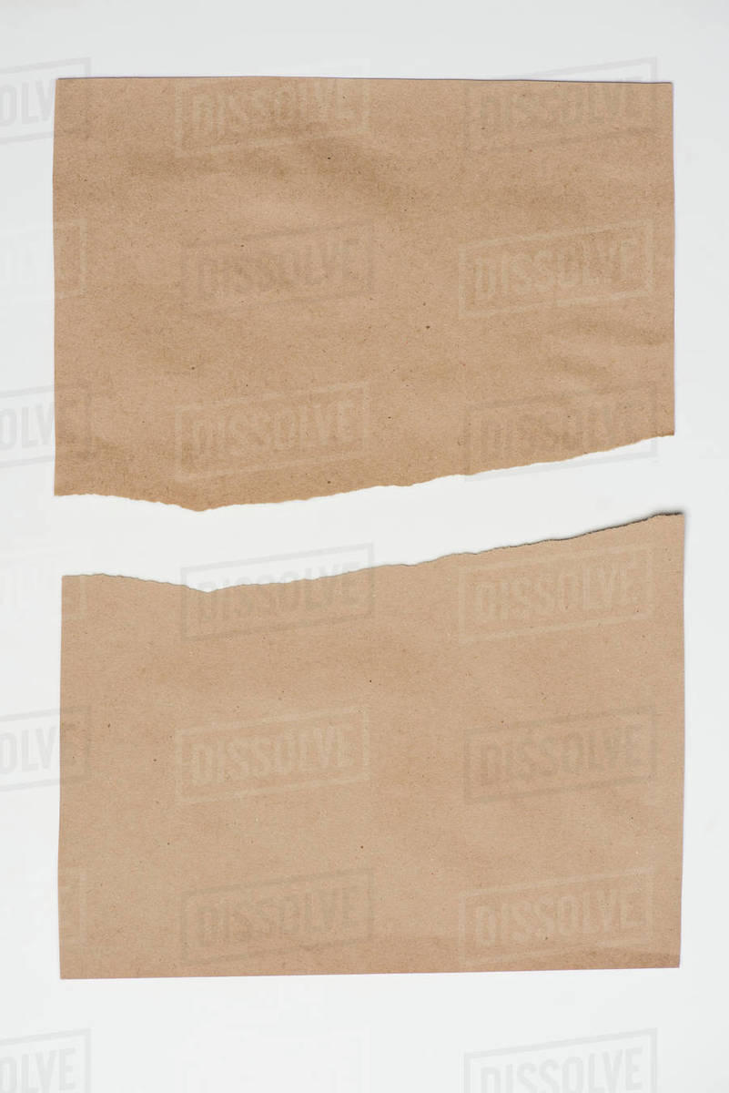 top view of ripped paper sheet isolated on white - Royalty-free Stock ...